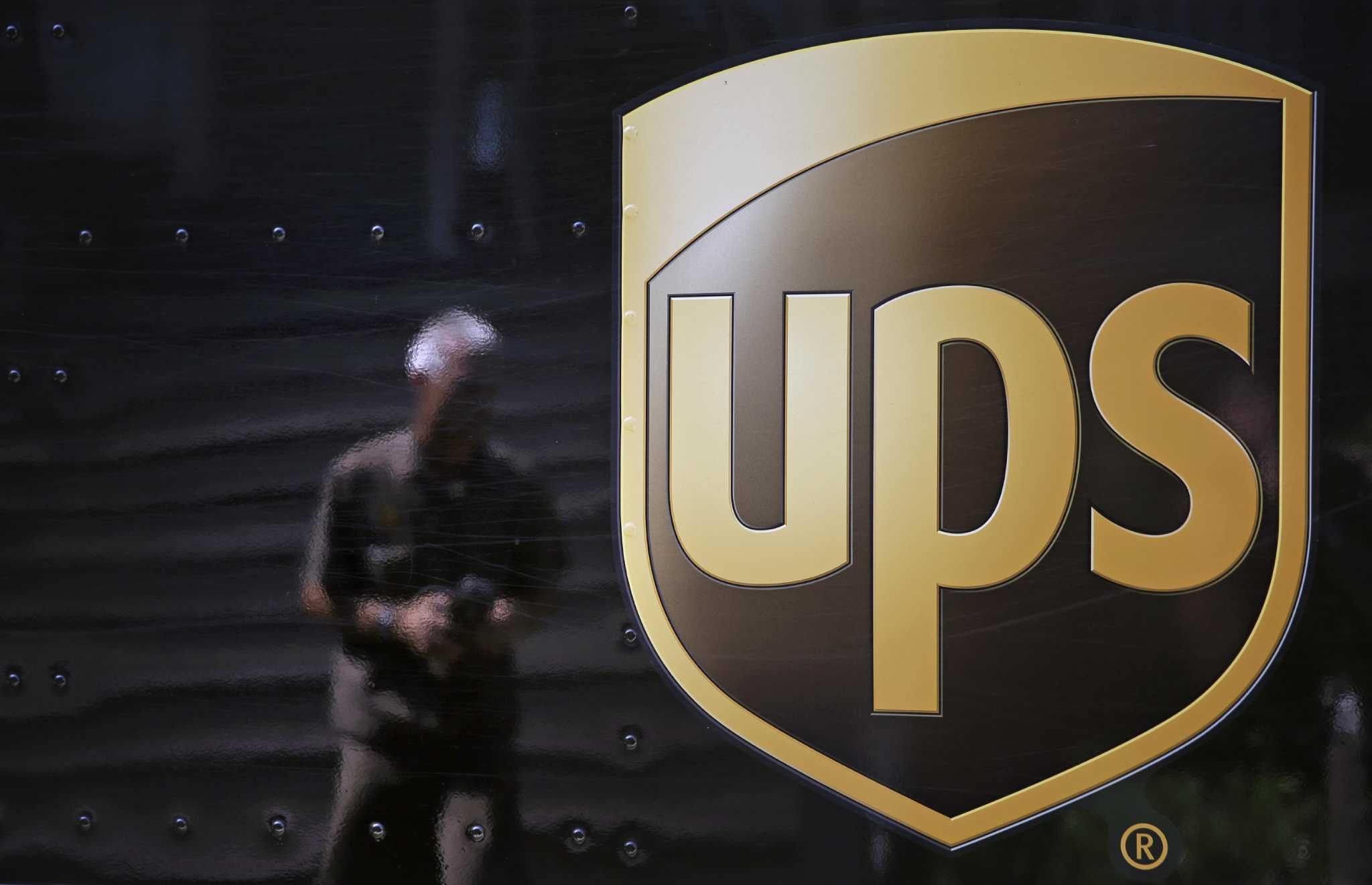 UPS grapples with stronger dollar, business shift to home deliveries