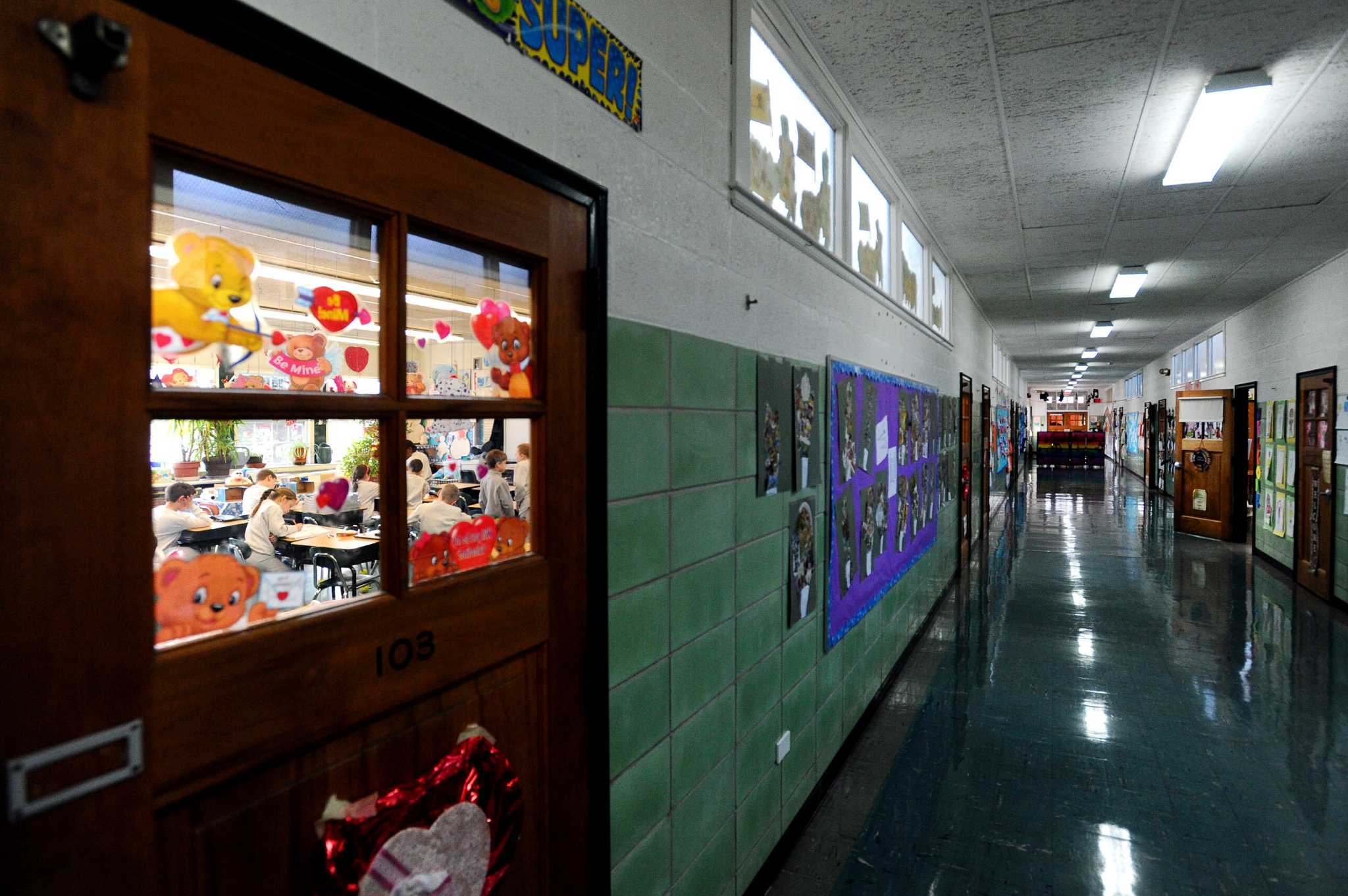 Stamford Catholic schools consolidation draws mixed reactions from parents