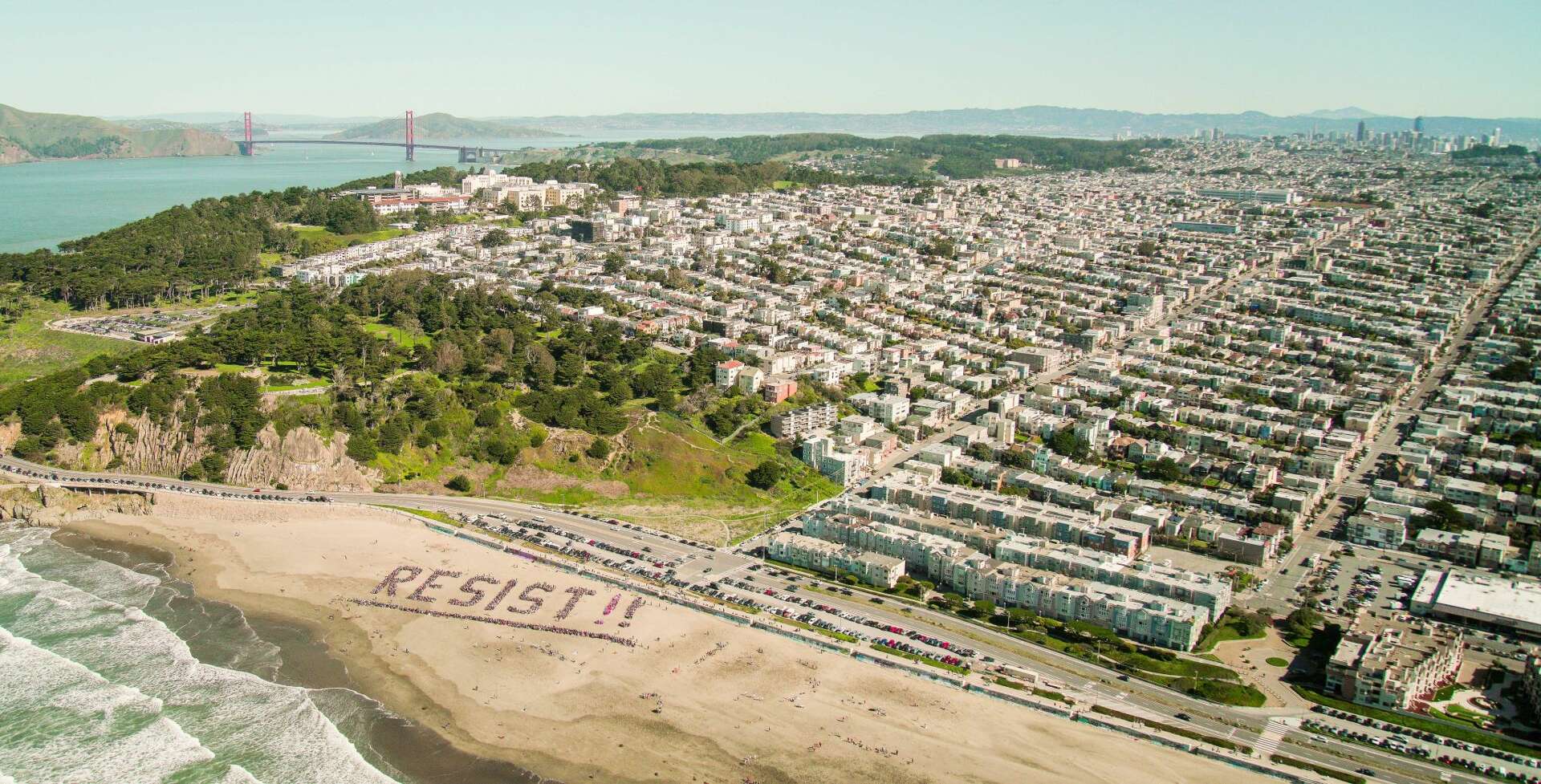 Thousands of protesters spell out 'RESIST!!' on San Francisco's Ocean Beach