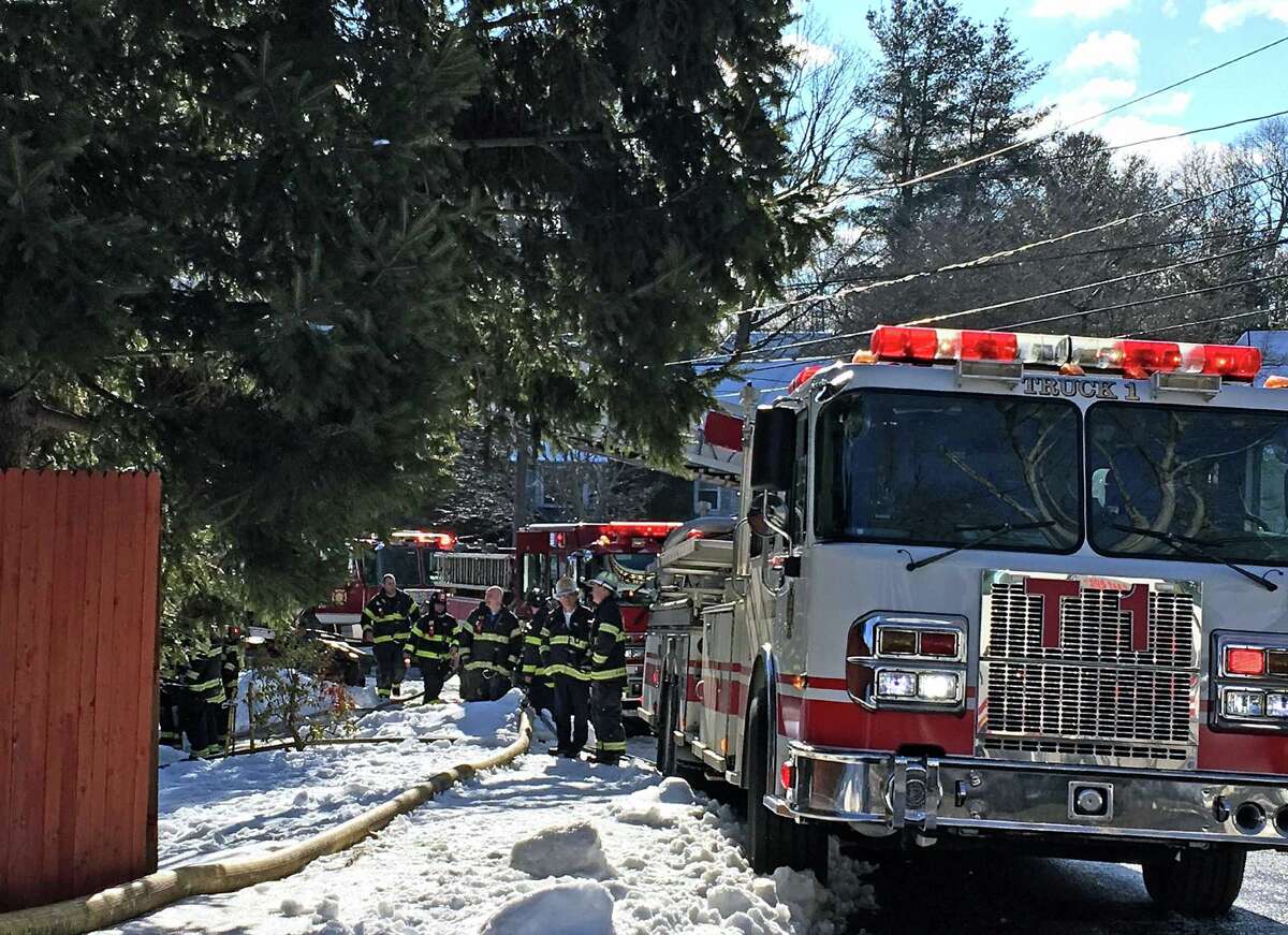 Norwalk firefighters battle house fire