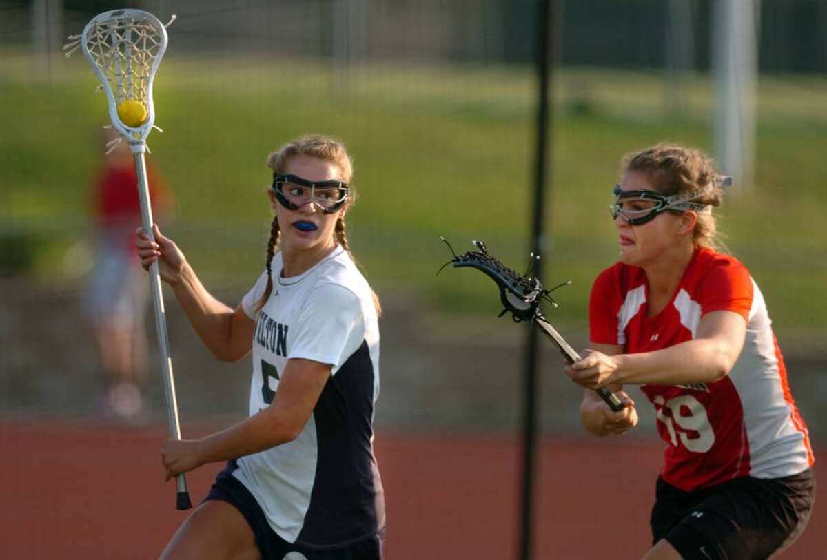 Wilton blows by New Canaan to win FCIAC girls lax crown