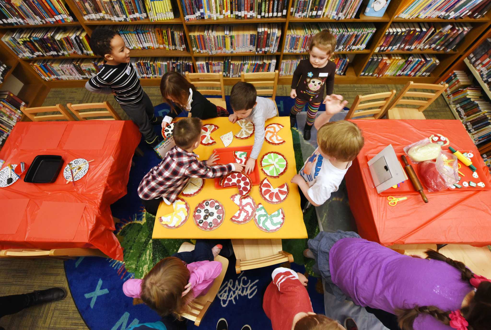 Toddlers check out pre-K at their library