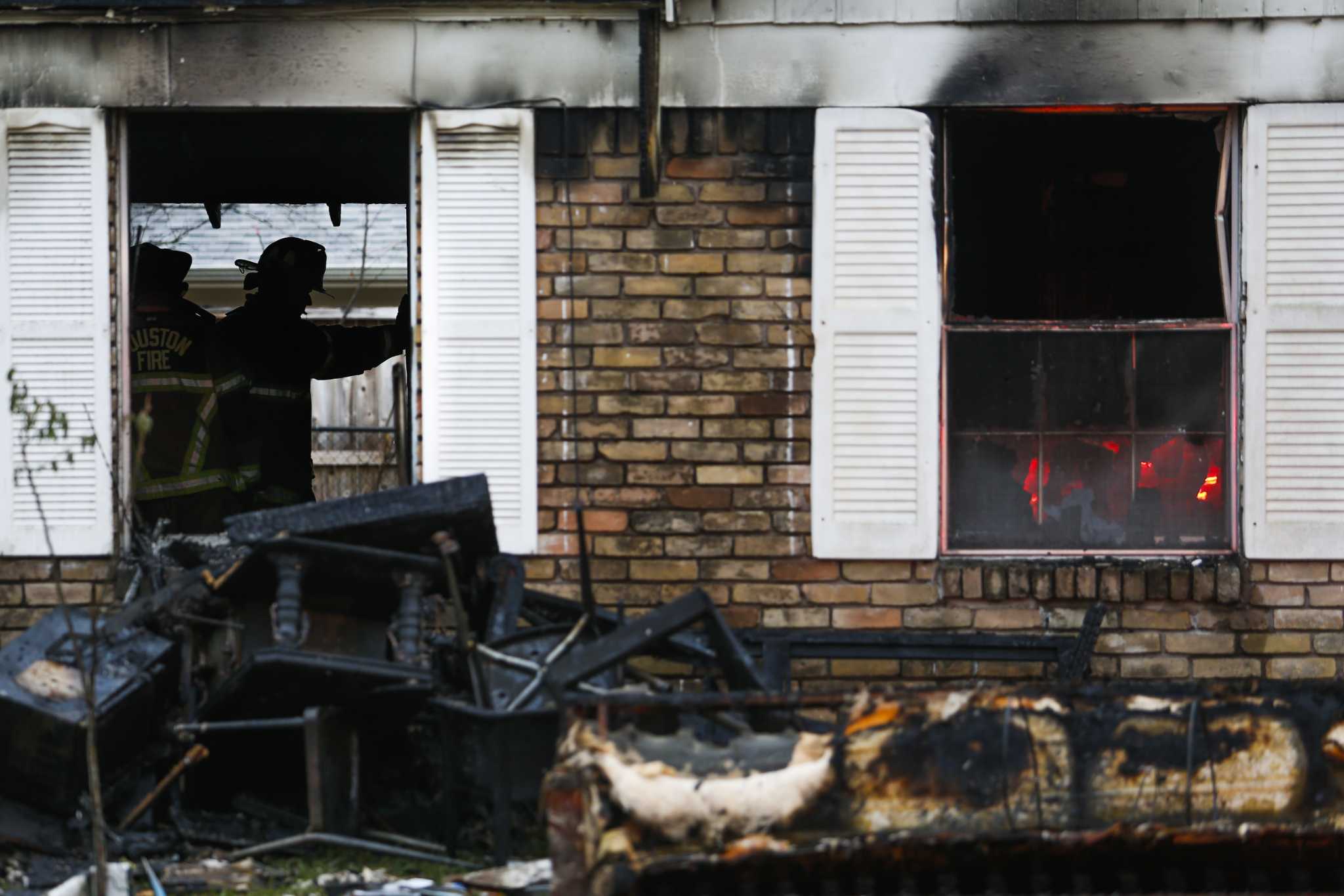 Three escape burning home in Sharpstown