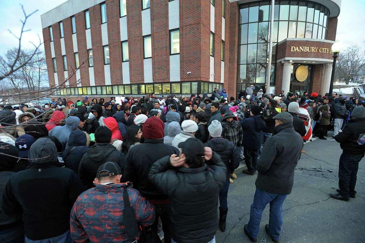 Danbury businesses shut down, residents rally in support of immigrants