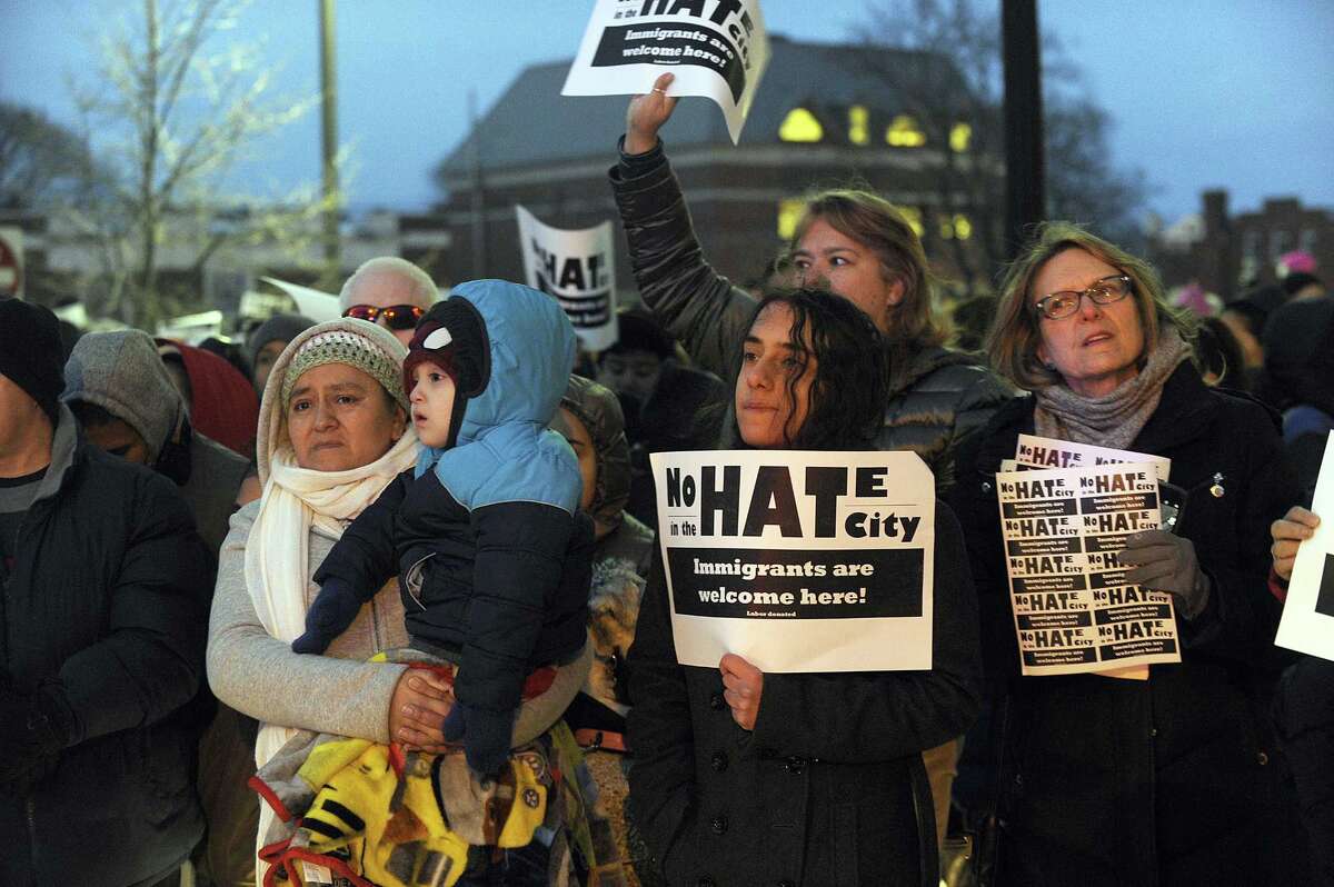 Danbury businesses shut down, residents rally in support of immigrants