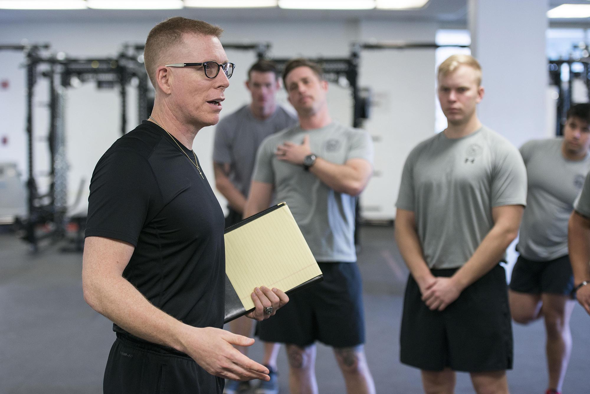 Airmen get tips on heavy lifting from Michigan State University coach