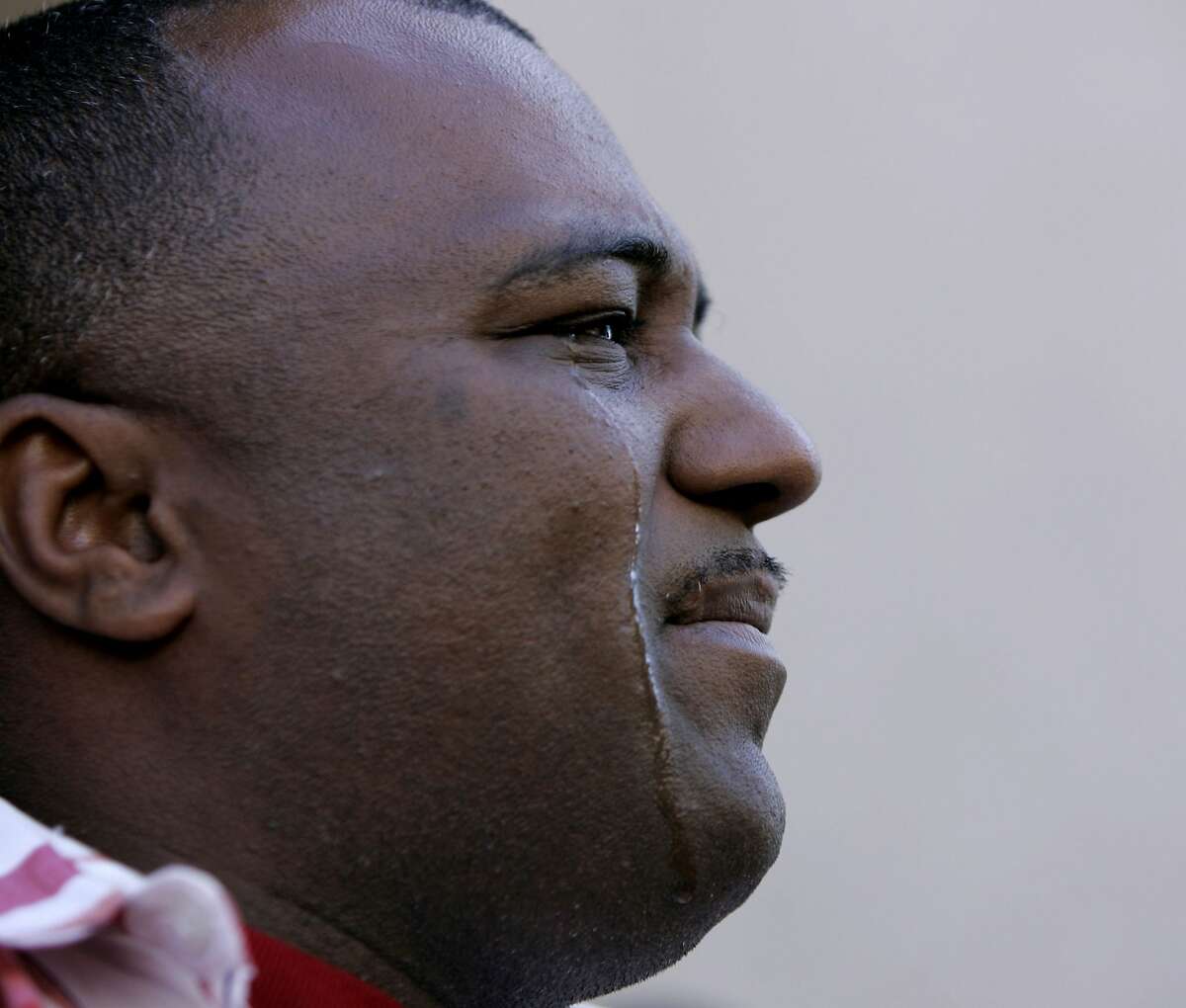 A dozen years after his son, Landrin Kelly is killed, police say