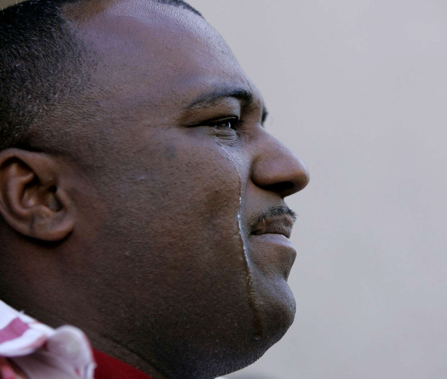 A dozen years after his son, Landrin Kelly is killed, police say