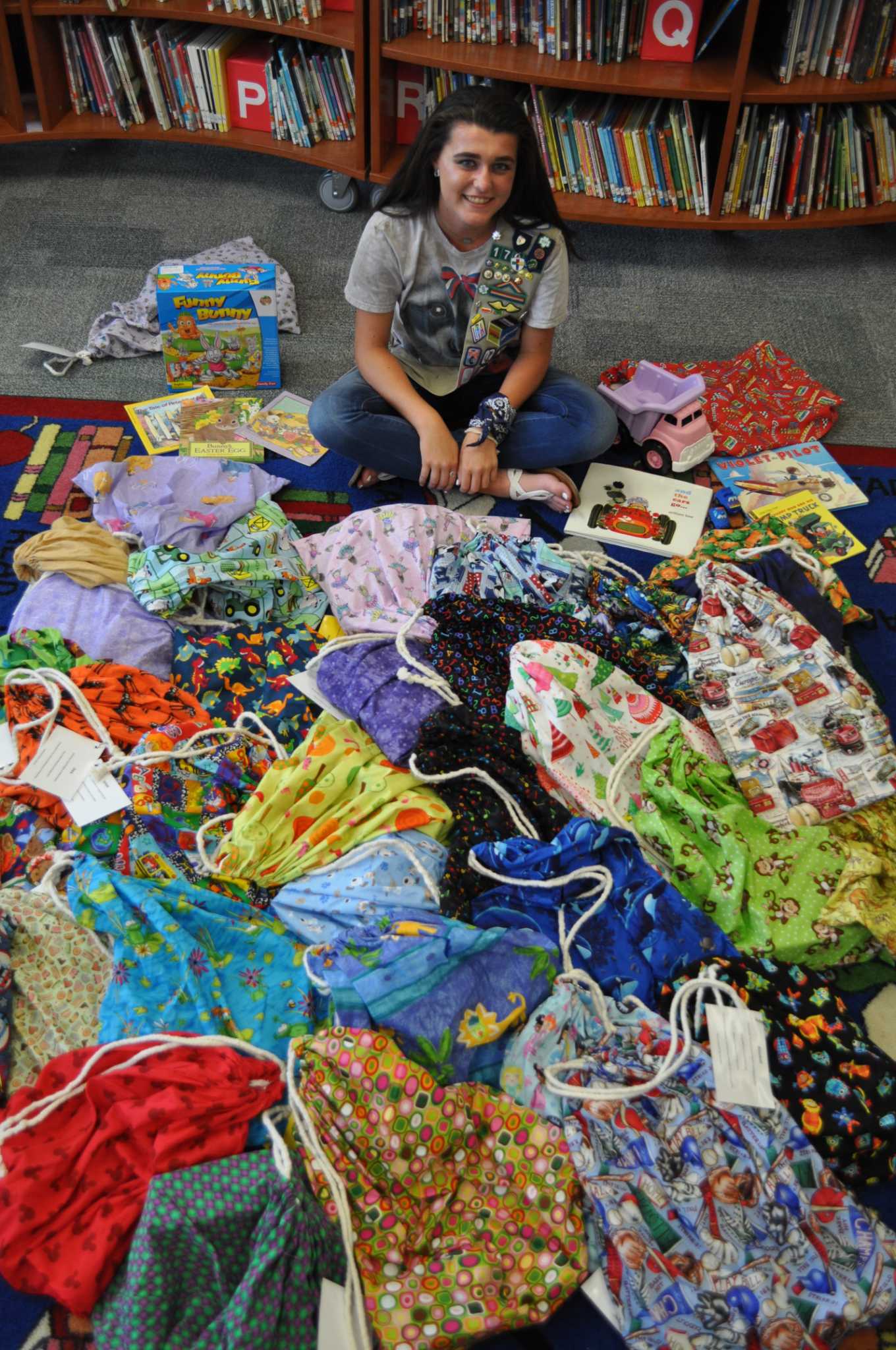 Magnolia student's "book bags" promoting literacy receives national ...