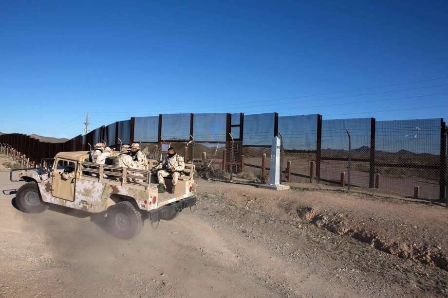 While U.S. troops deploy to Mexico border, photos show it's not a war ...