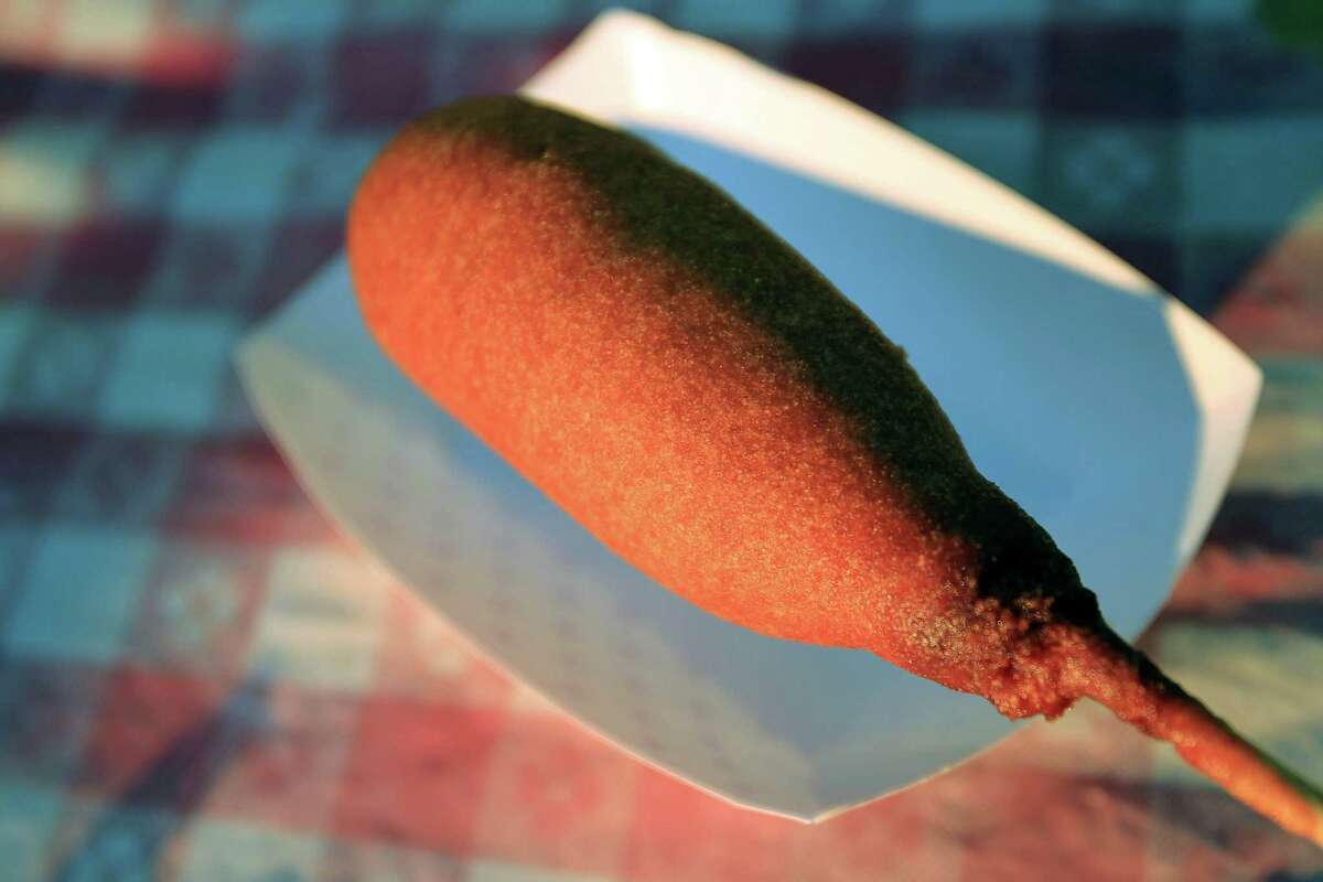 Scouting out the best food at the rodeo carnival