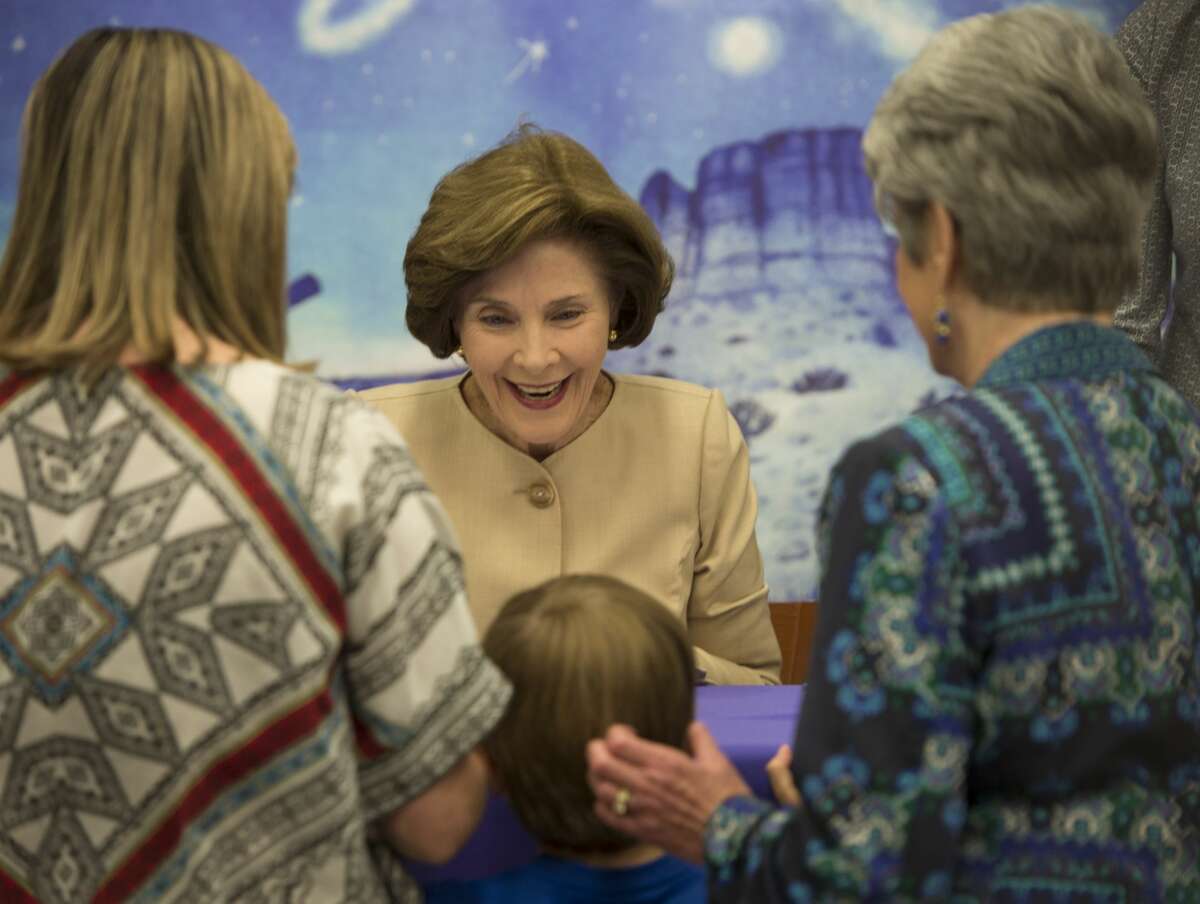 Laura Bush signs children’s books at Centennial branch