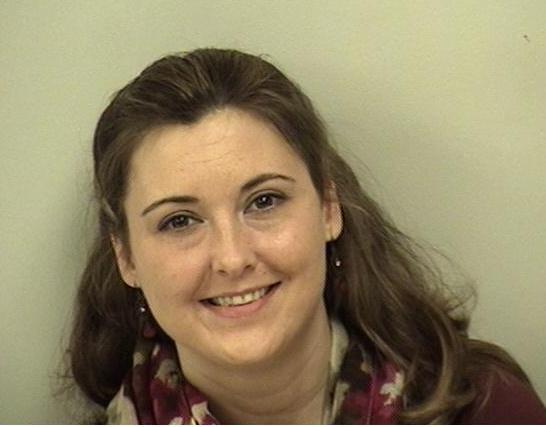 Monroe woman accused of harassing child