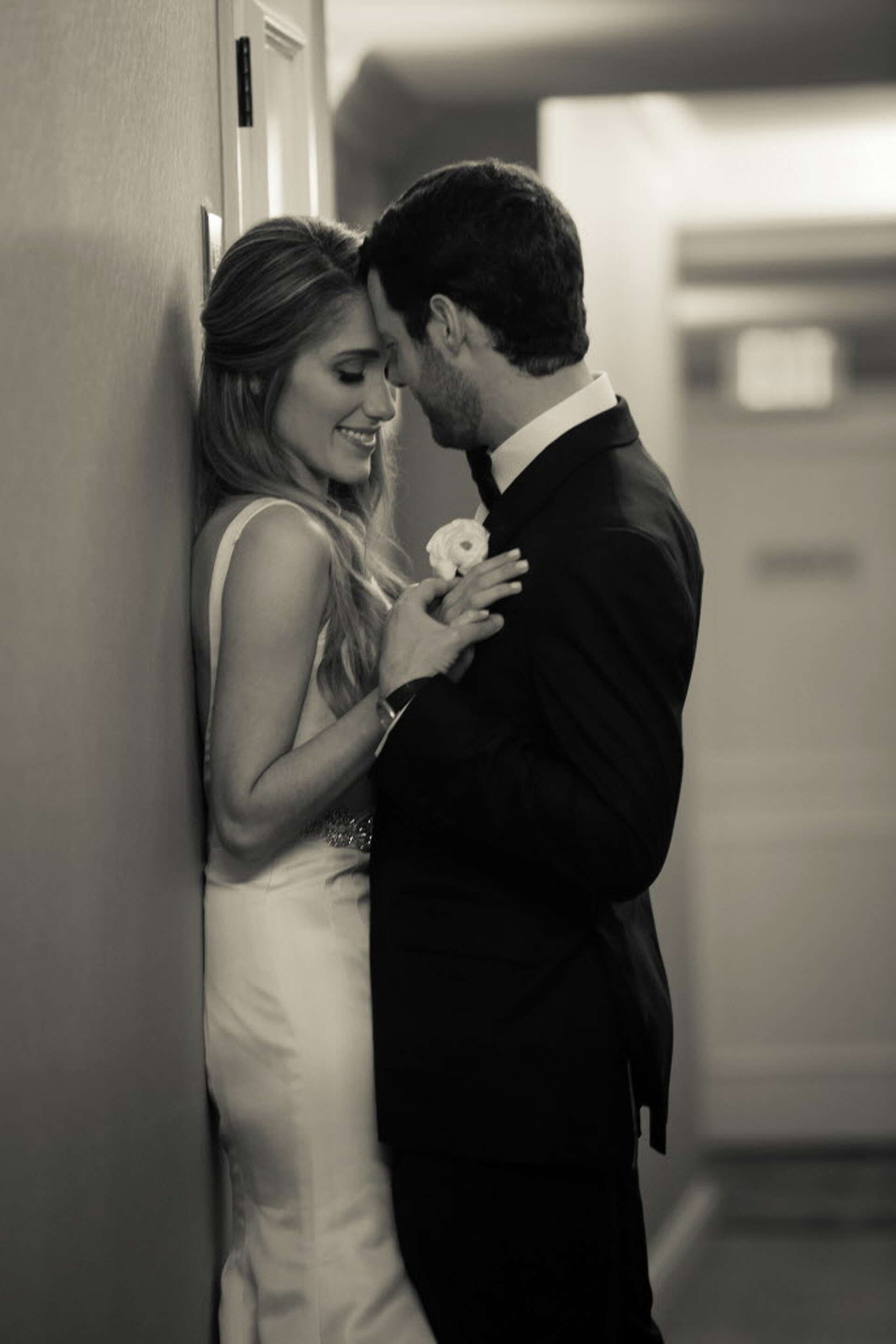Family friends tie the knot at Four Seasons, one floor above bride's office
