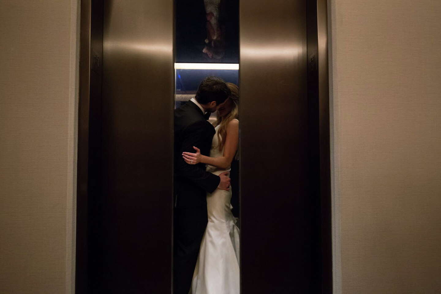 Family friends tie the knot at Four Seasons, one floor above bride's office