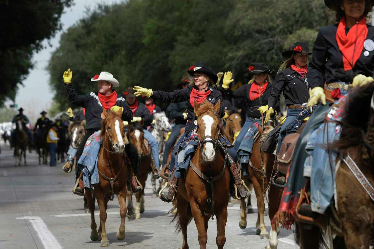 Spectators line streets for annual downtown rodeo parade