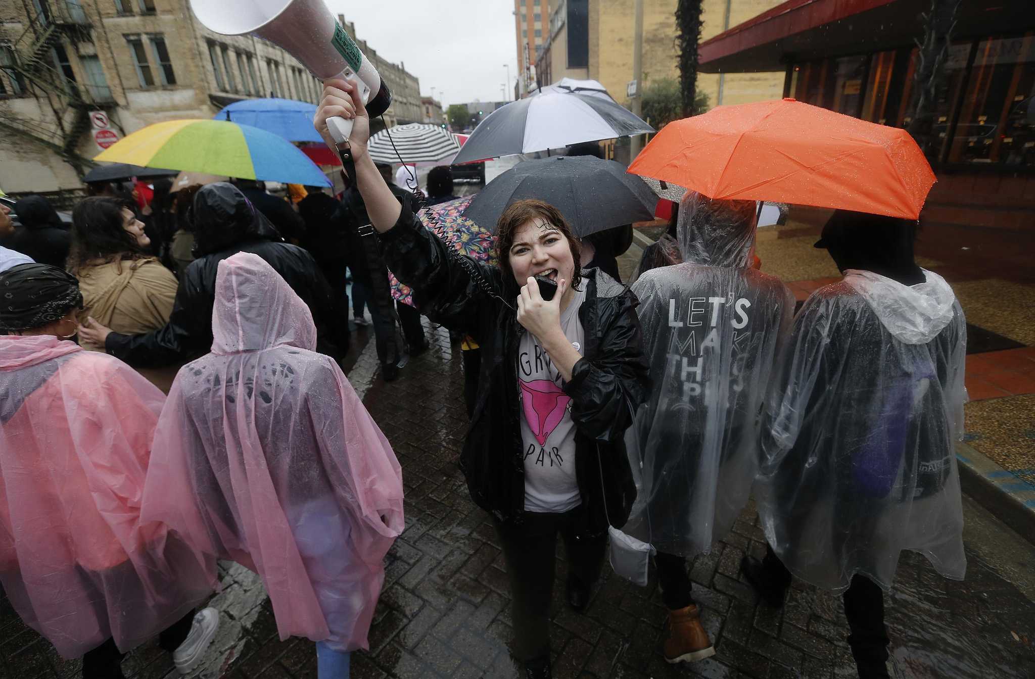 Rainy day doesn’t stop Woman’s Day March downtown