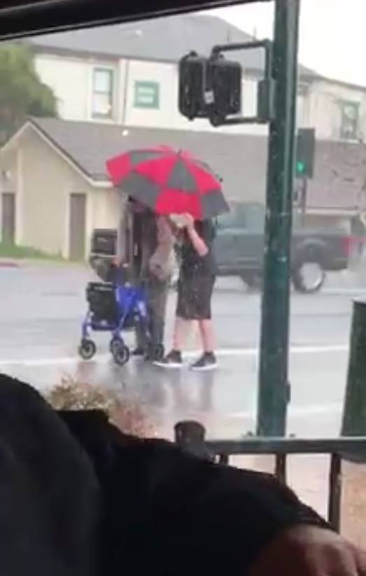 A Vallejo teen helps an elderly person during a recent hail storm