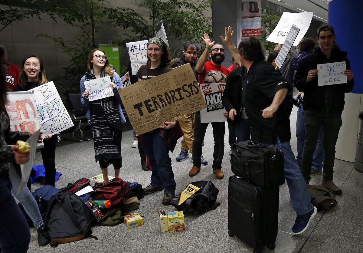 Protesters rally against travel ban at SFO