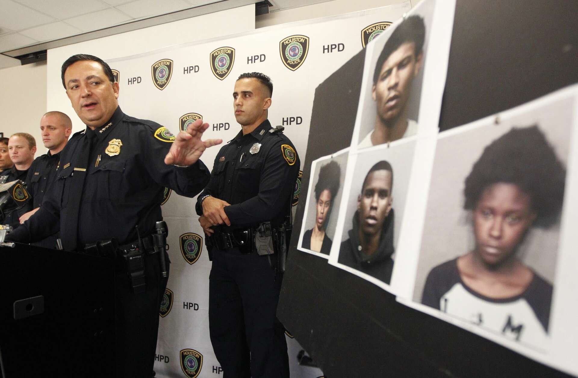 Four gang members charged in home invasions, sex assault