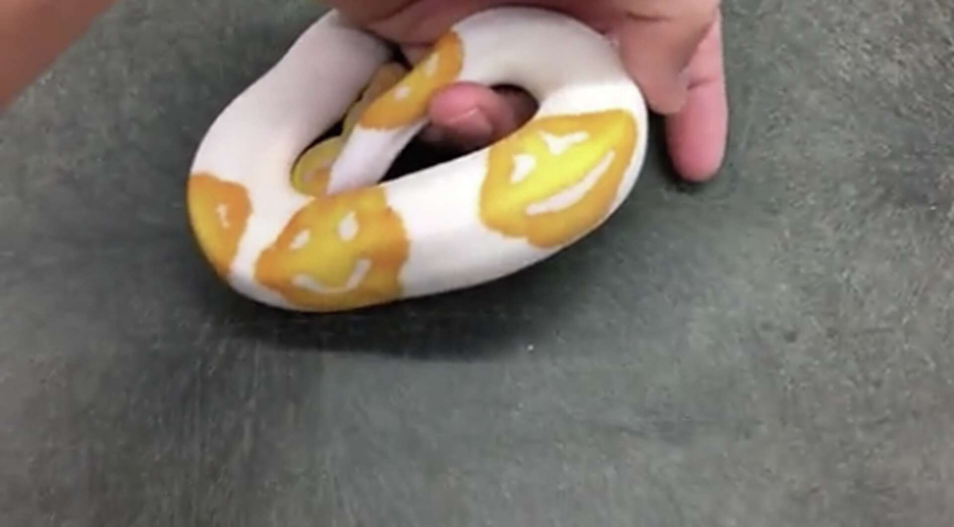 Python found covered in emoji markings