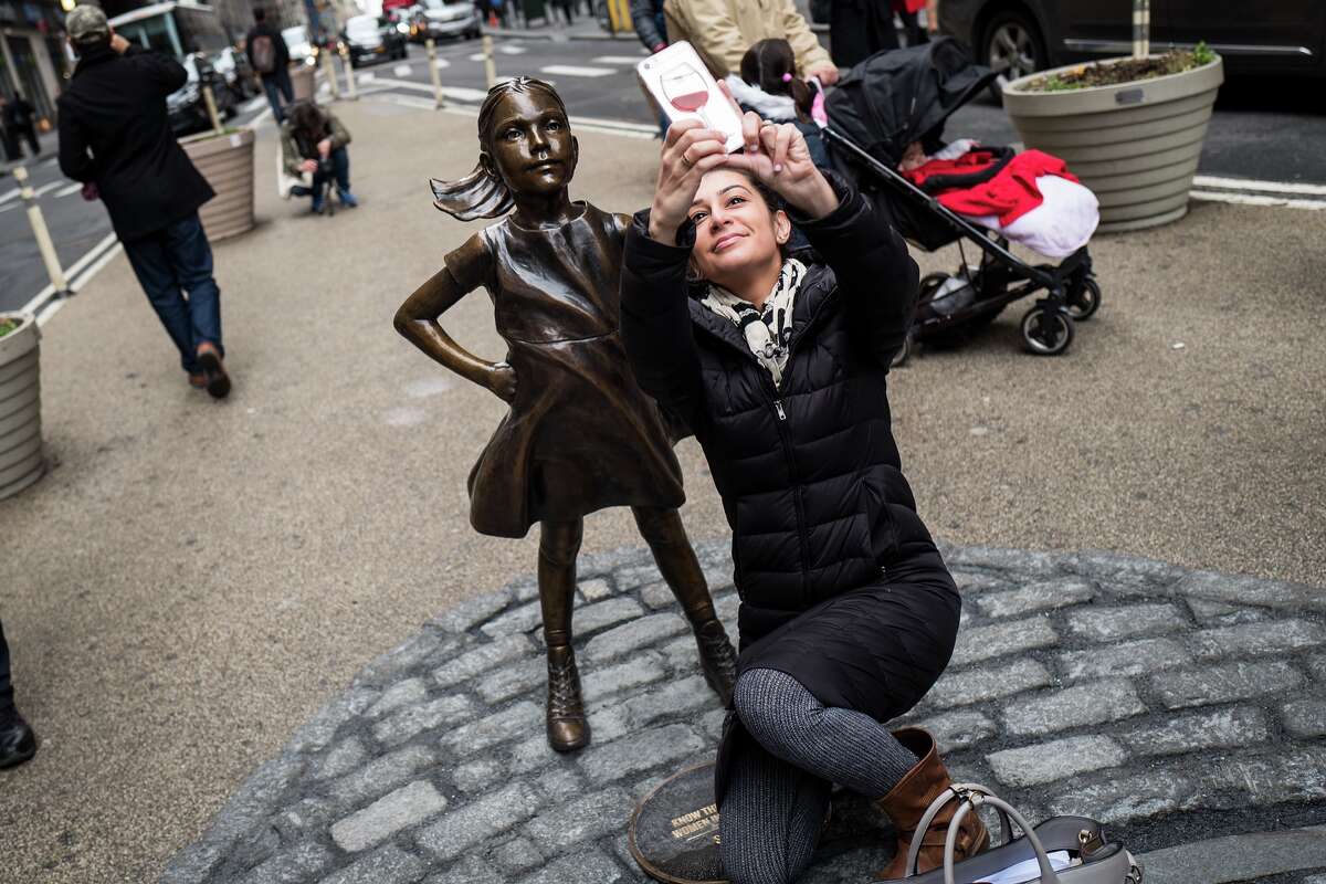 Photo: Man appears to desecrate 'Fearless Girl' statue on Wall Street