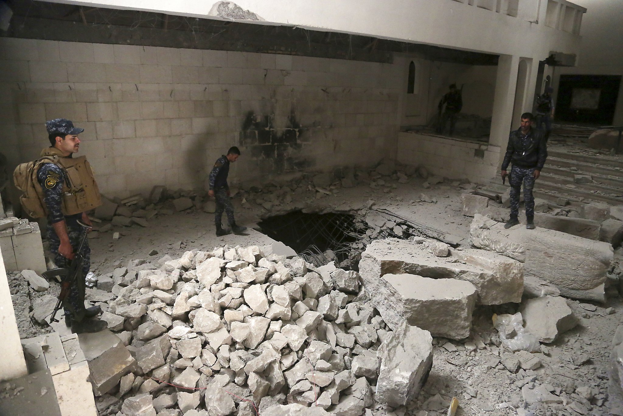 Rubble and ash in Mosul museum retaken from Islamic State