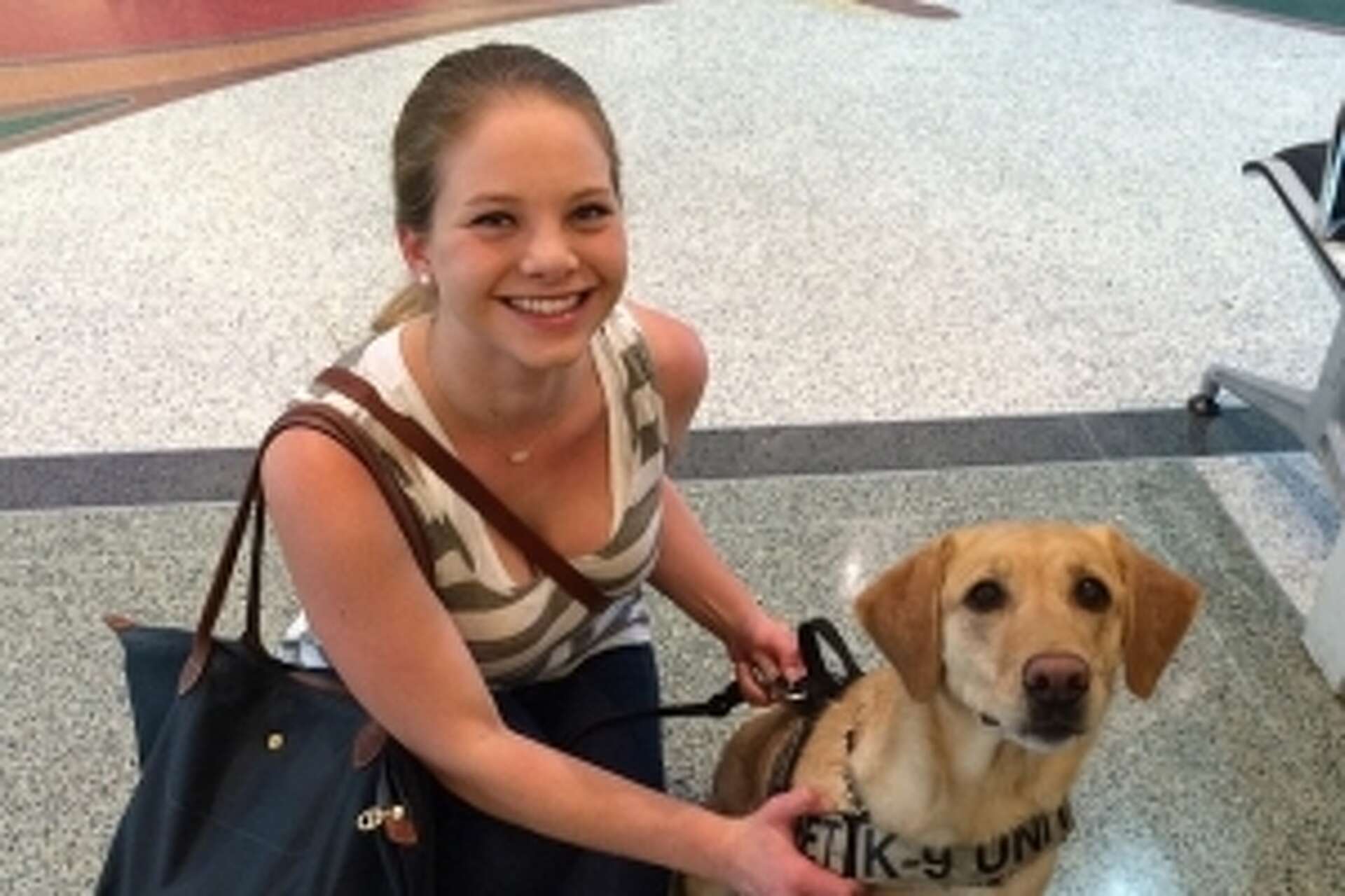 This adorable Houston TSA dog loves her job, loves the camera