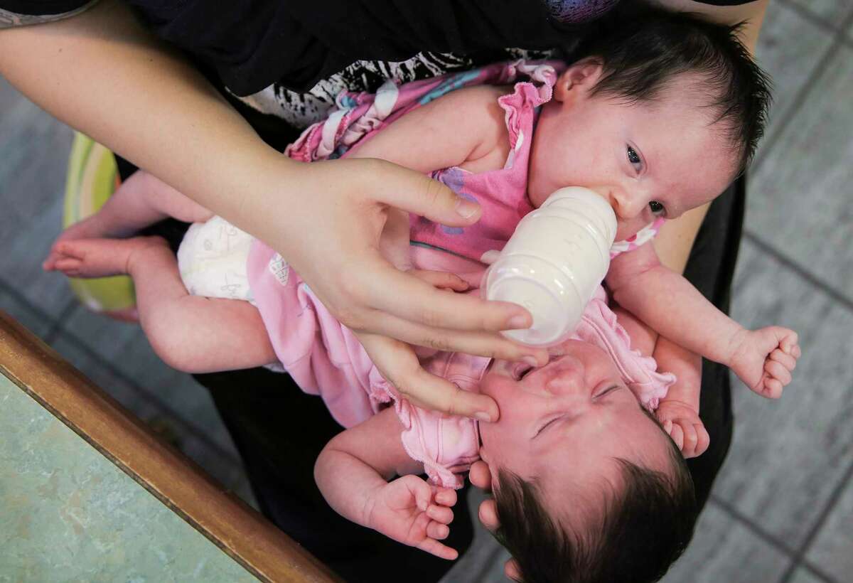 Family with conjoined twins heads home to Idaho