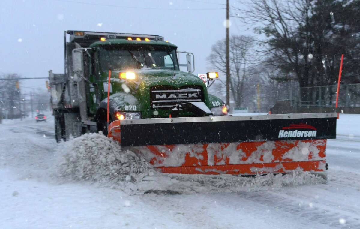 In Photos: Late-season snowstorm grips Norwalk