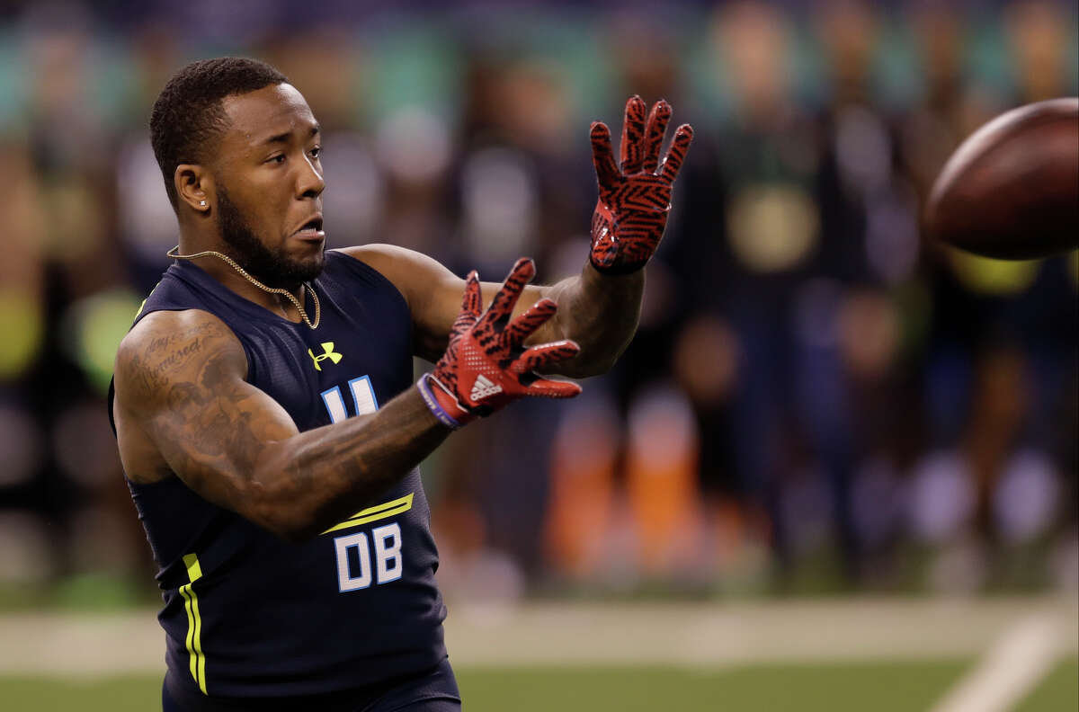 Police: Relative of former UW football star Budda Baker shot to death ...