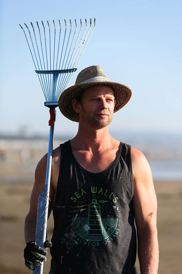 Rake artist uses beach as canvas