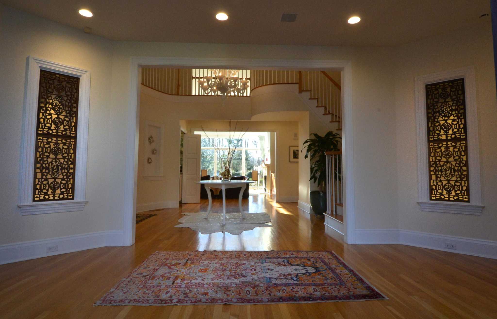 Ancient Chinese screens focal point of contemporary house