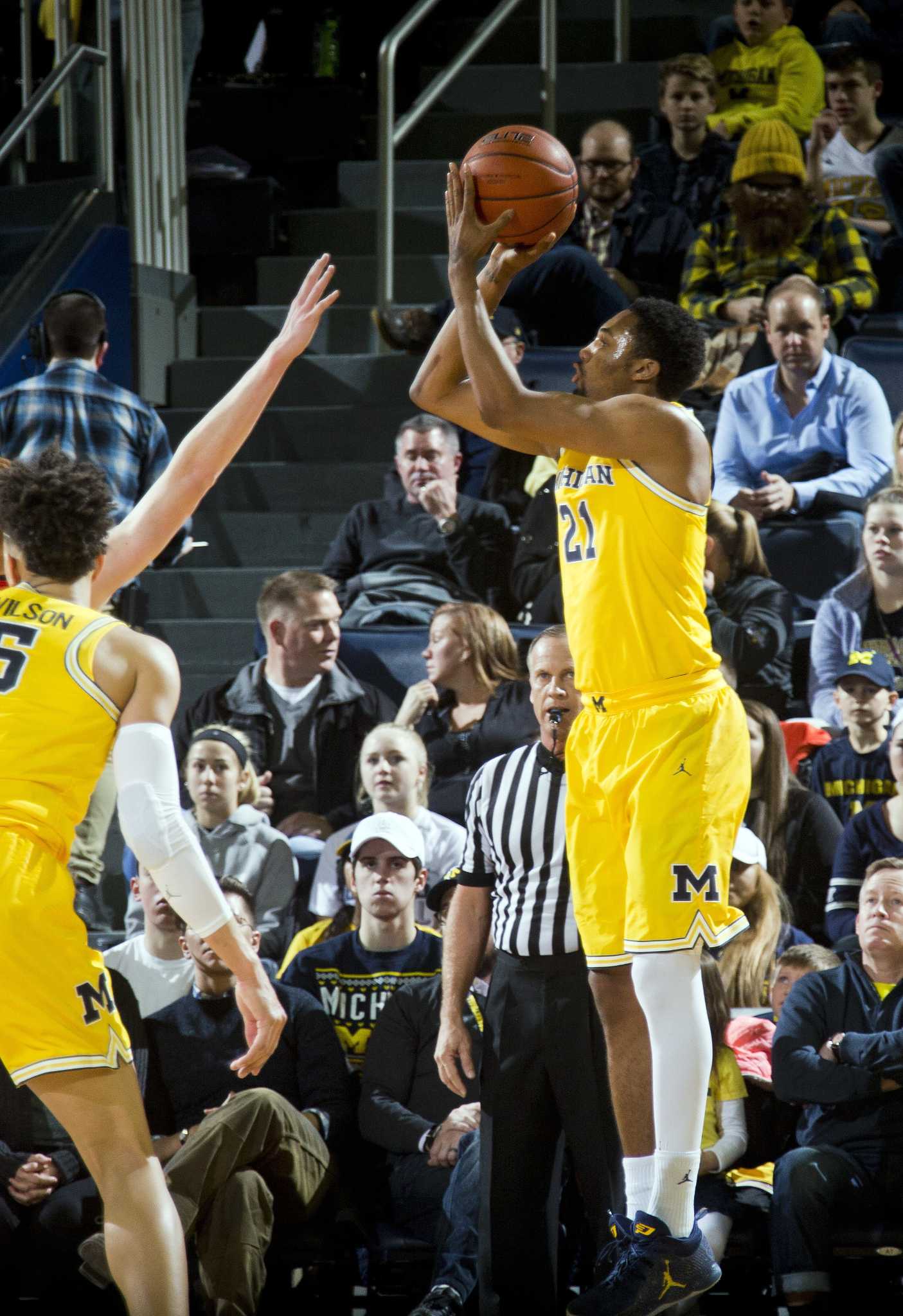 NCAA HOOPS: College basketball evolving into distinctively NBA game