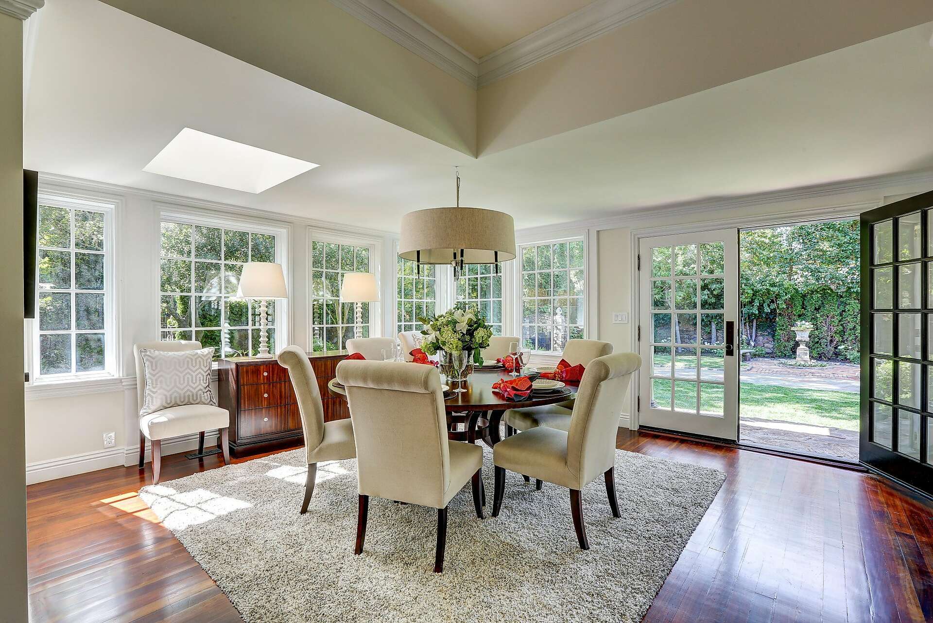 Soothing style, welcoming pool patio defines Dutch Colonial in Ross