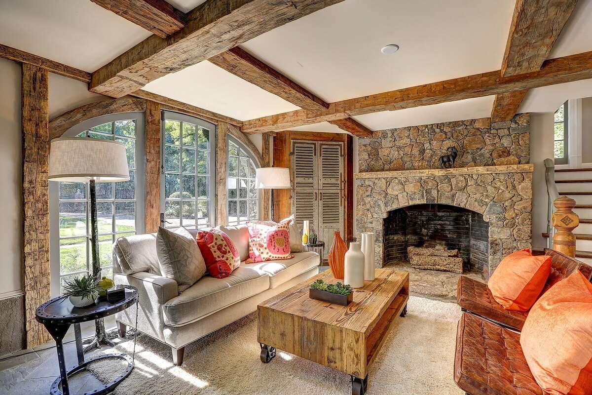 Soothing style, welcoming pool patio defines Dutch Colonial in Ross