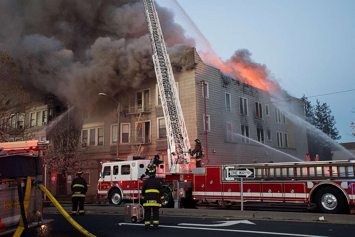 3 people killed as fire burns troubled Oakland building