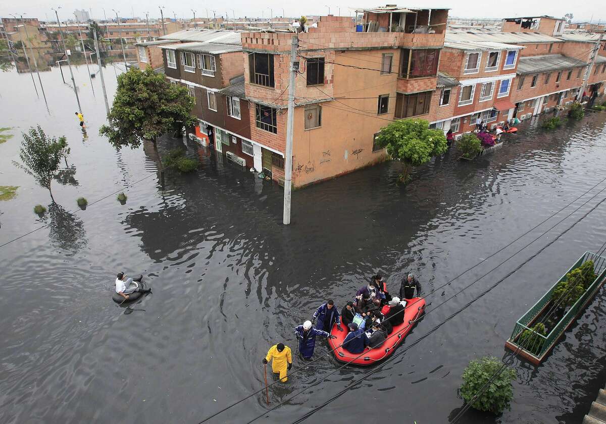 Frantic search for Colombia flood survivors as toll passes 200