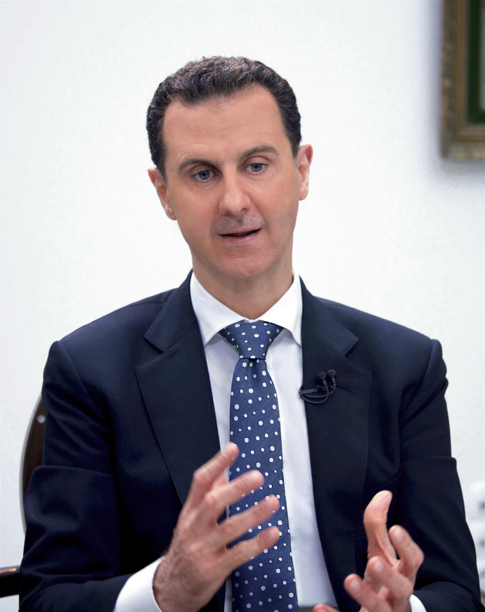 White House makes clear it's not trying to push Assad out