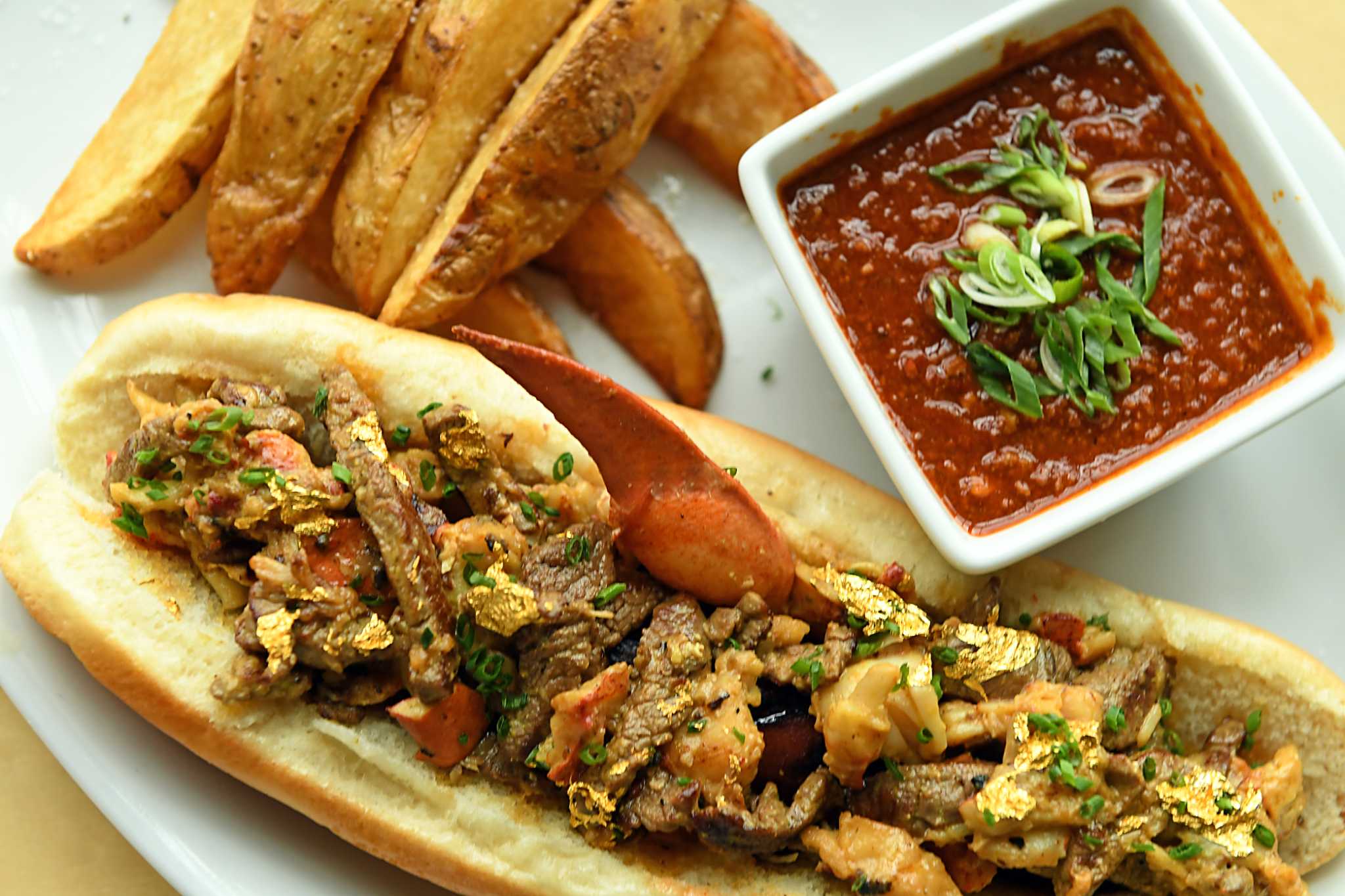 How does Ken Hoffman rate Houston's fancy $124 hot dog? You guessed it