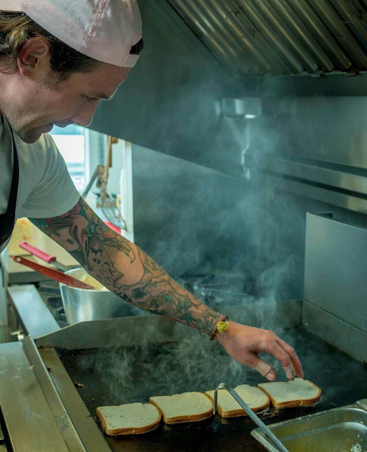 Former Saison chef now cooking hamburgers in a caboose