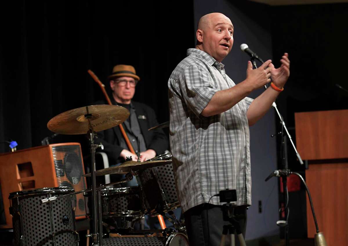 Musician plays drum set made of Legos