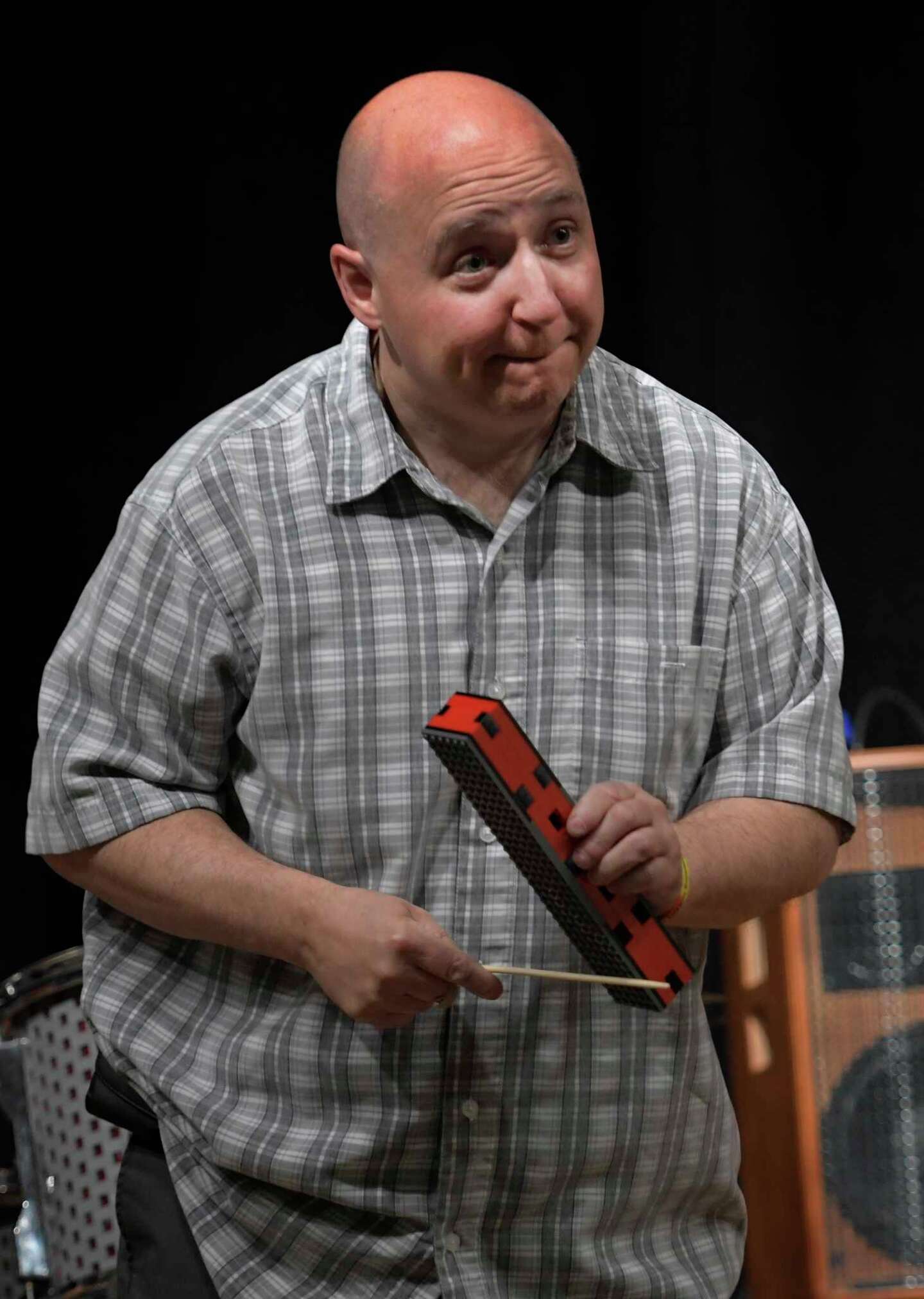 Musician plays drum set made of Legos