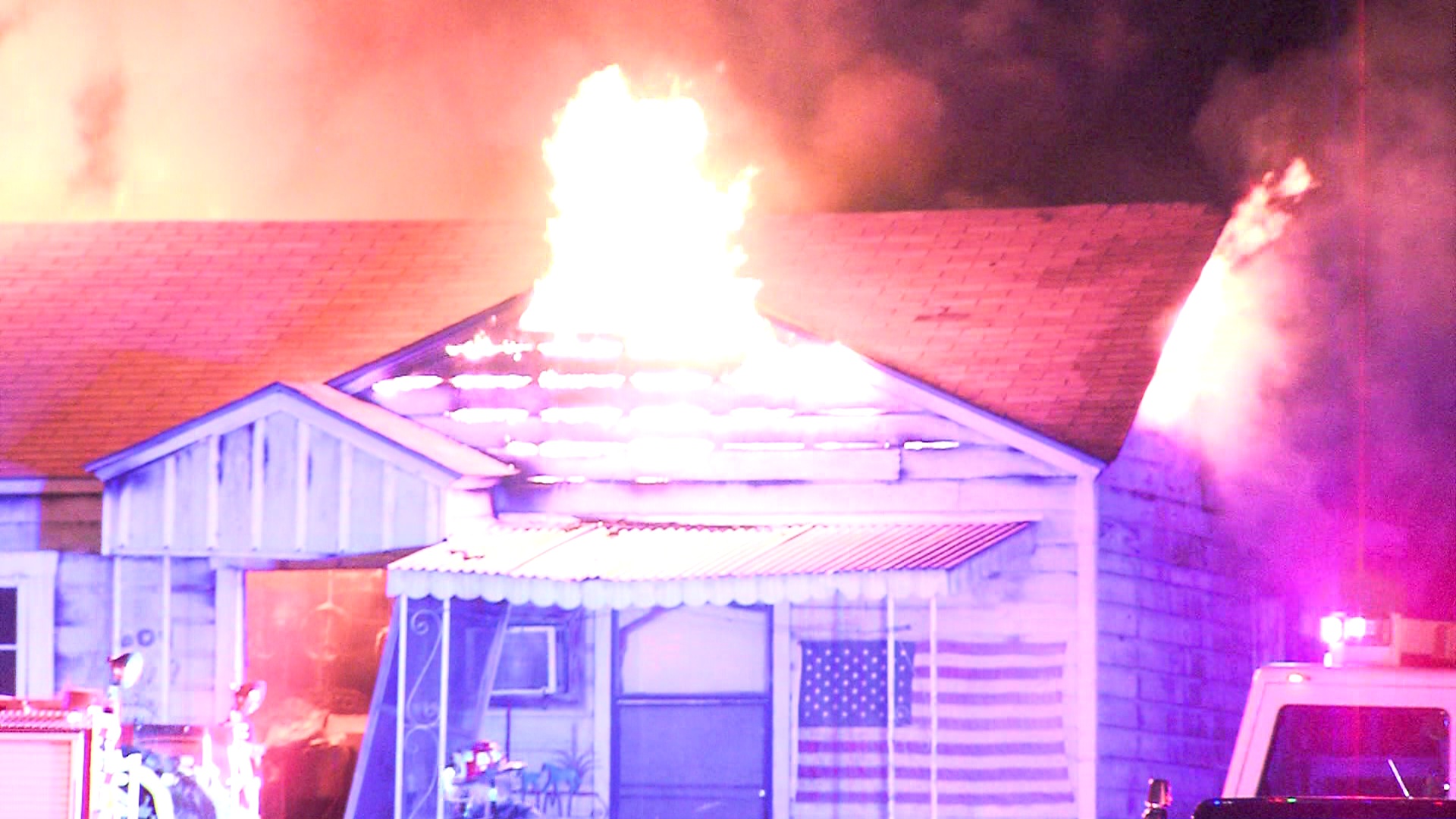 Flames shoot out of attic, destroy West Side home