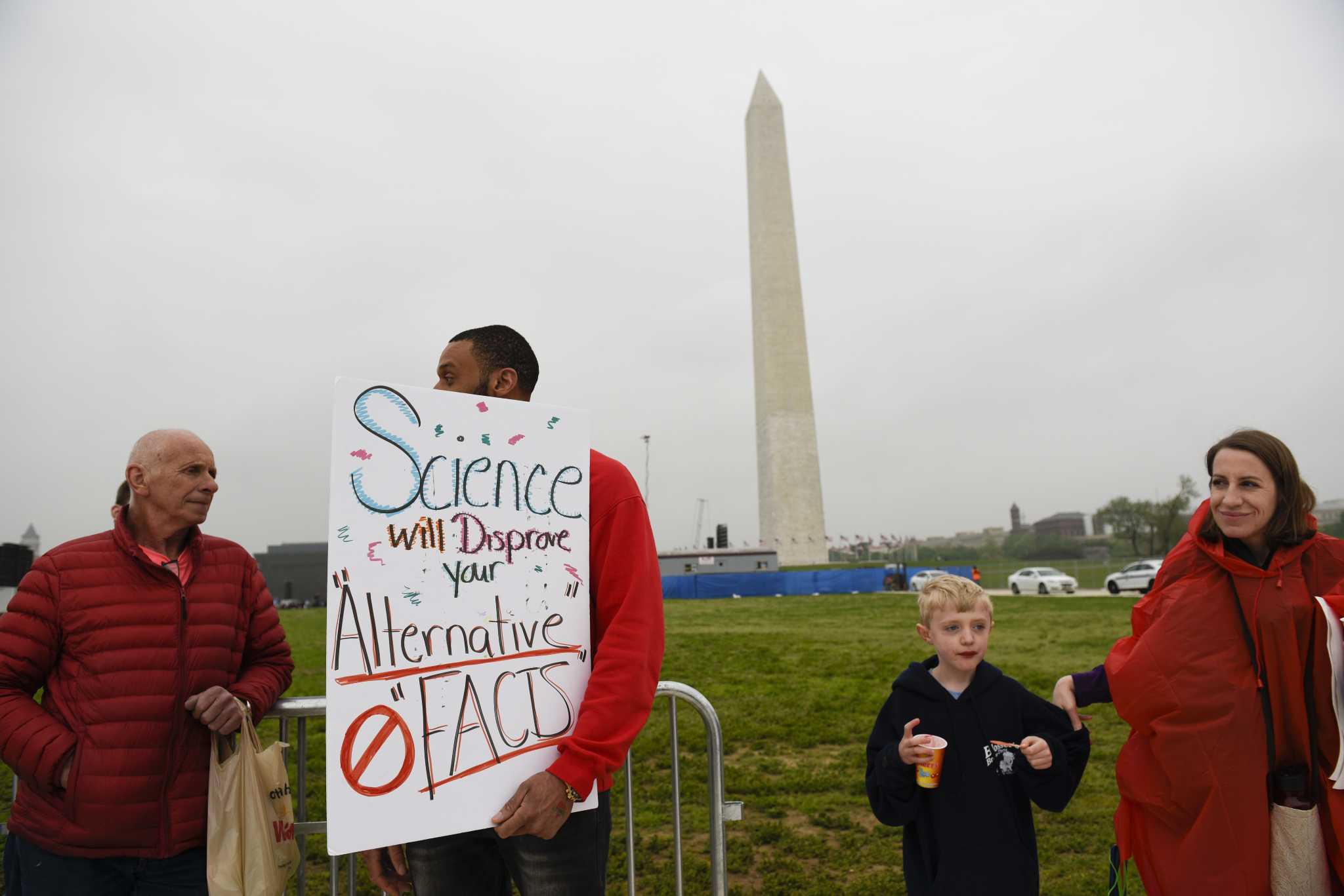 Scientists leave labs, take to streets to defend research