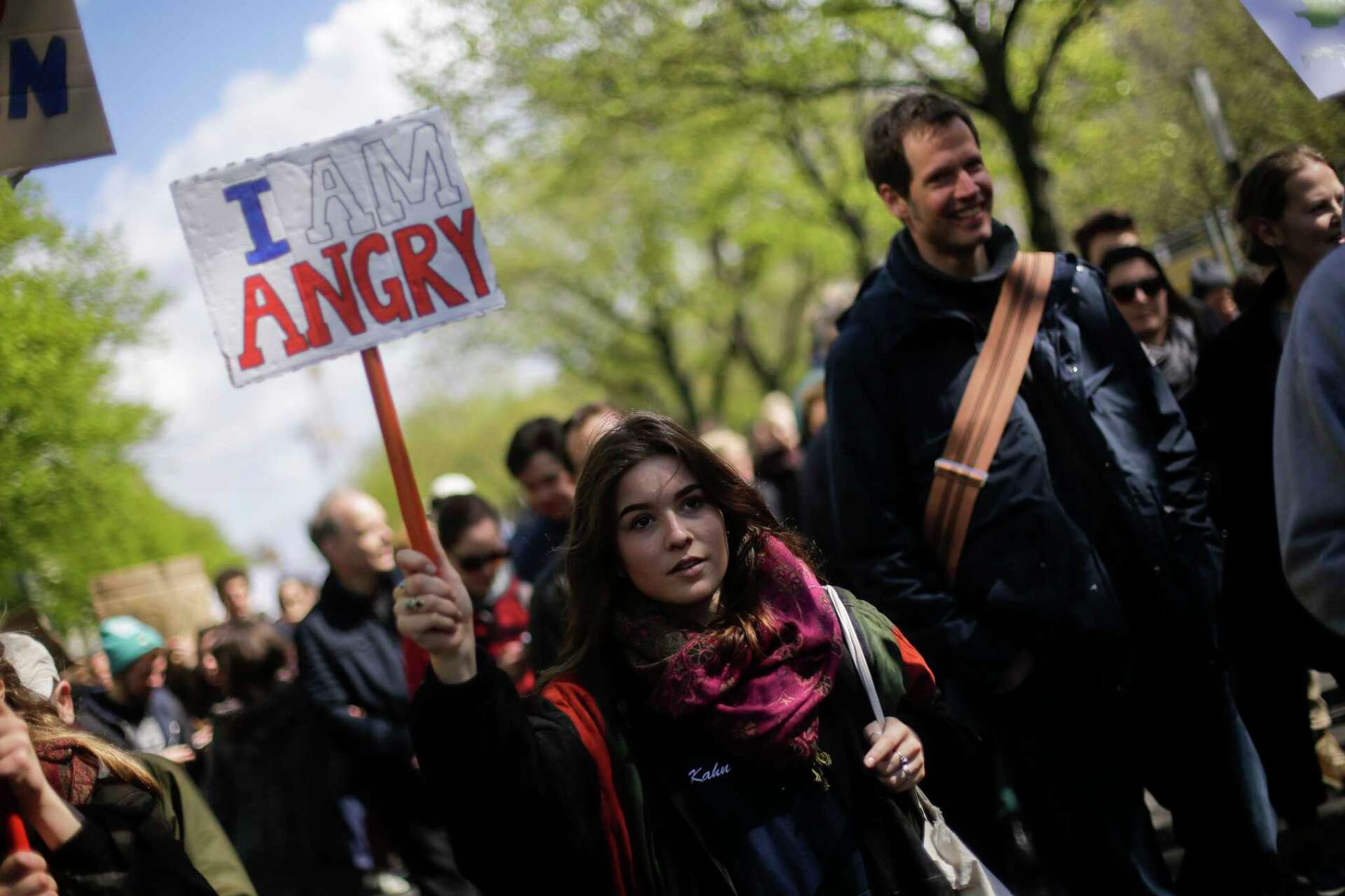Scientists leave labs, take to streets to defend research