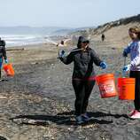 Hundreds clean up SF’s Ocean Beach for Surfrider Earth Day event - SFGate