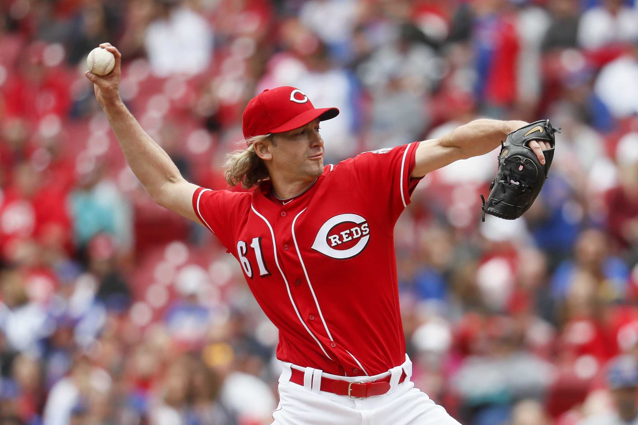 Reds' Arroyo turns back time vs. Cubs