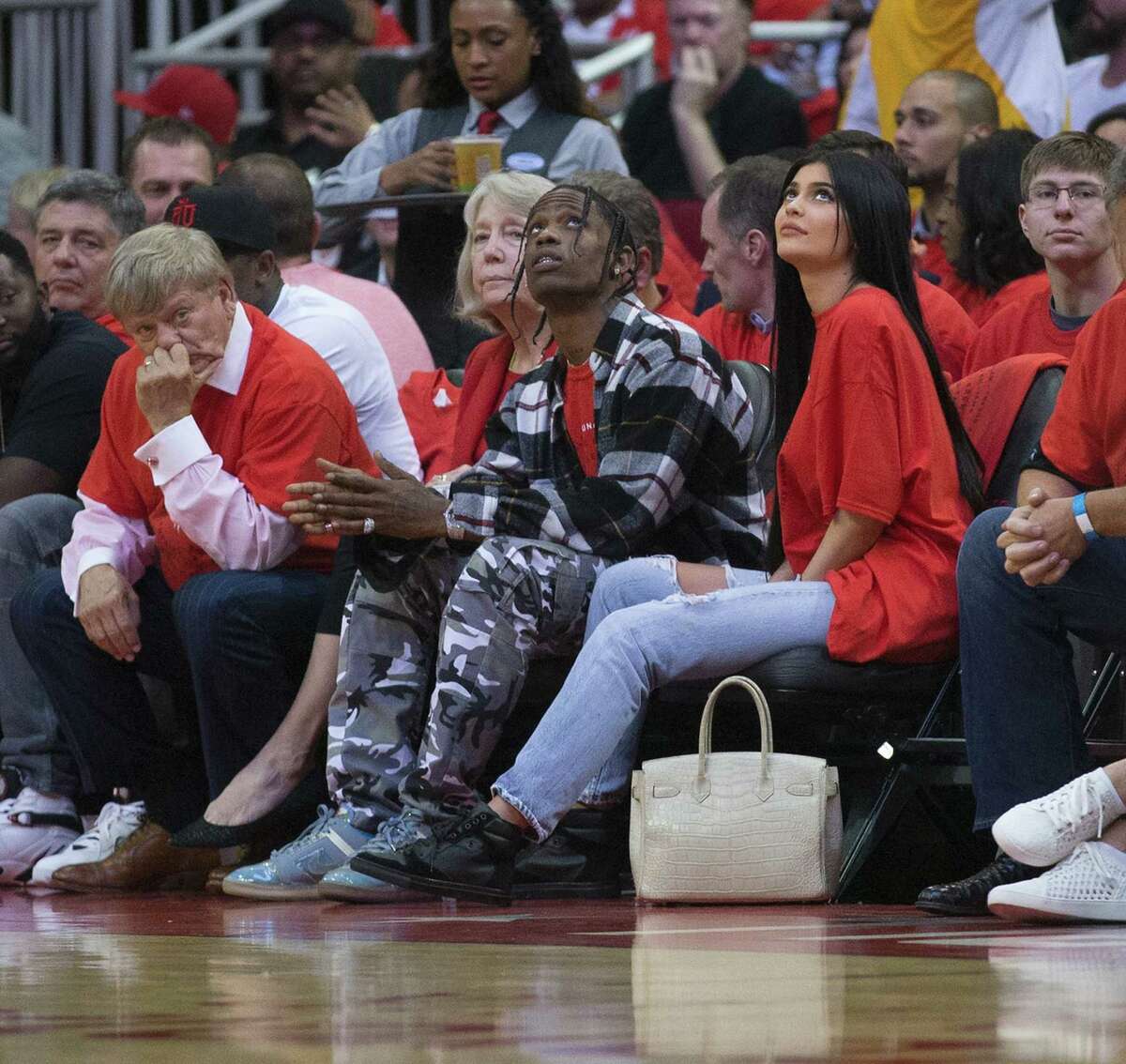 Travis Scott starts busy Thursday night by yelling at Spurs players