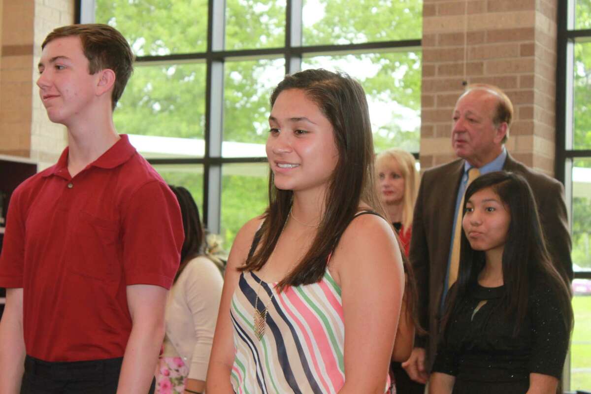 Conroe teacher, community pave path for 10 freshmen
